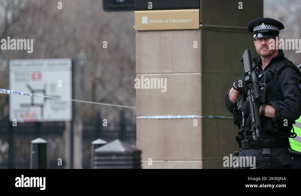 Armed police stand Stock Videos & Footage - HD and 4K Video Clips - Alamy
