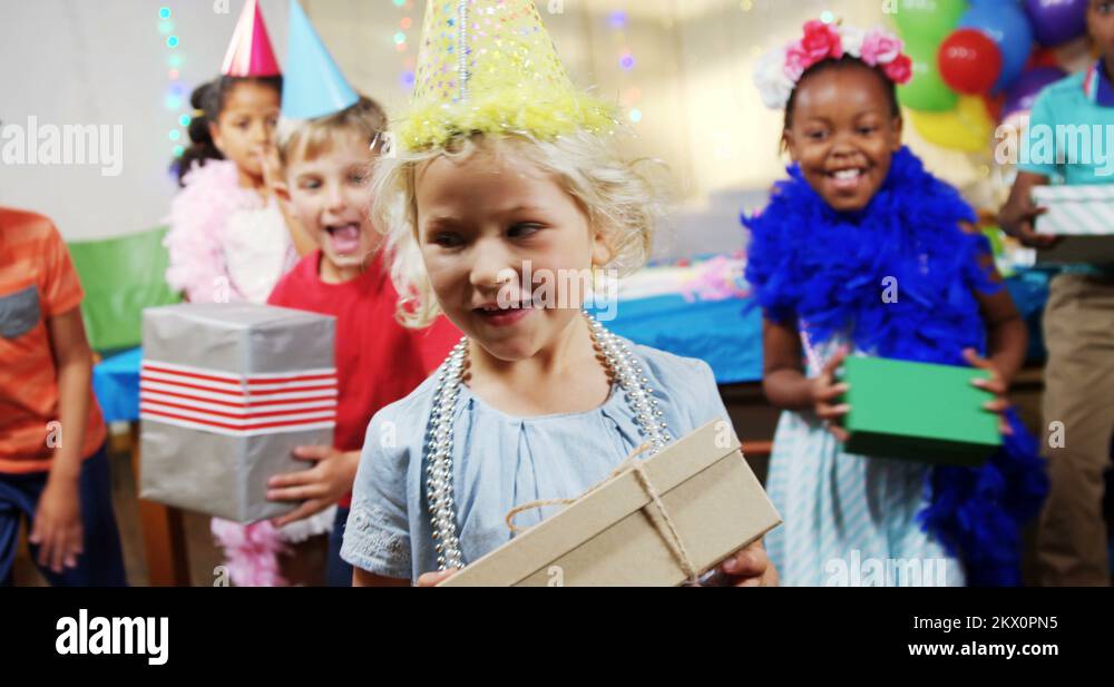 Birthday girl receiving gift boxes from friends 4k Stock Video Footage ...