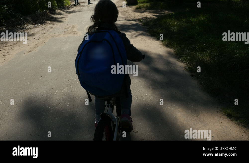 Happy child riding a bike. Little girl on a bicycle. Healthy preschool ...