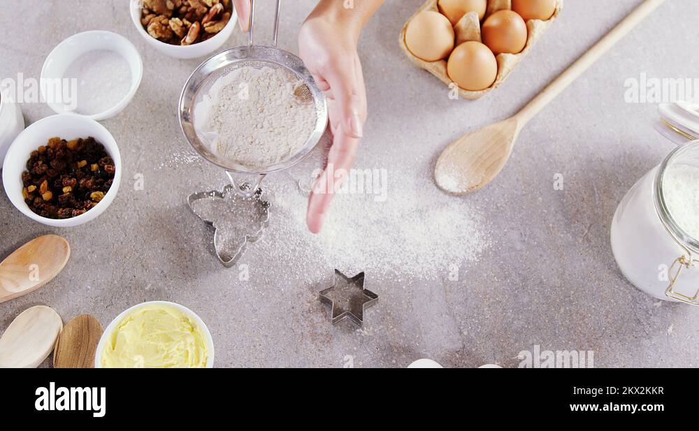 Woman staining flour in sieve 4k Stock Video Footage - Alamy