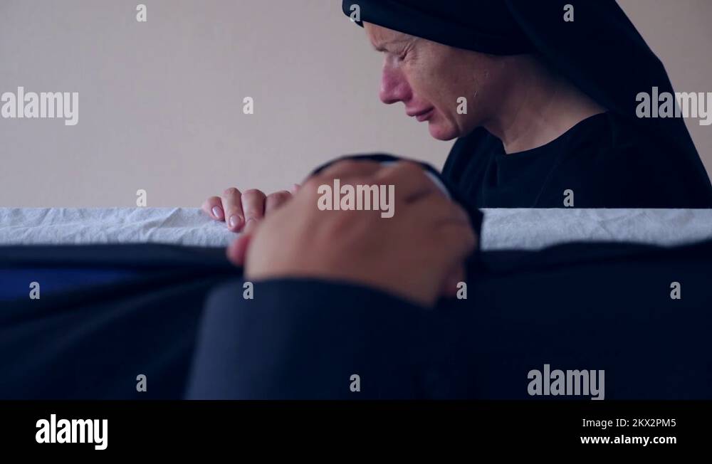 funeral, sadness and mourning concept - sad woman talking and crying ...