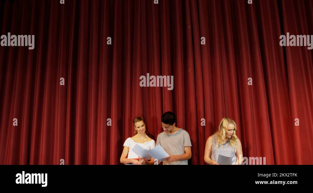 Actors reading their scripts on stage 4k Stock Video Footage - Alamy