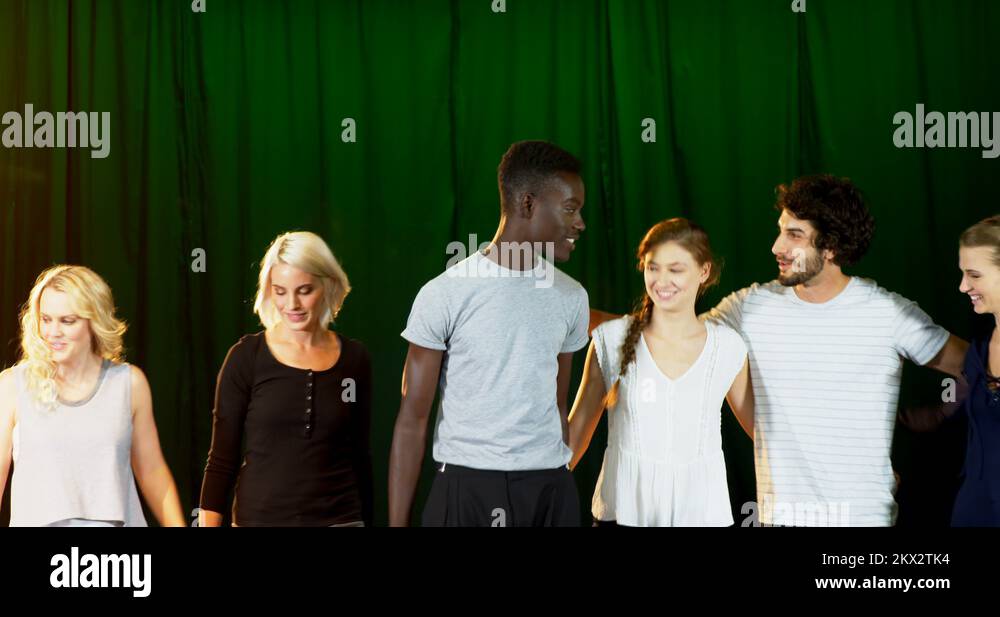 Actors team forming hands stack on stage 4k Stock Video Footage - Alamy