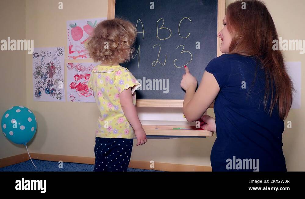 Kindergarten teacher teaching letters Stock Videos & Footage - HD and ...