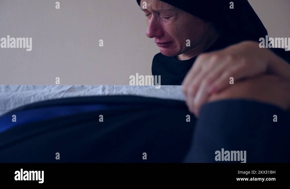 funeral, sadness and mourning concept - sad woman talking and crying ...