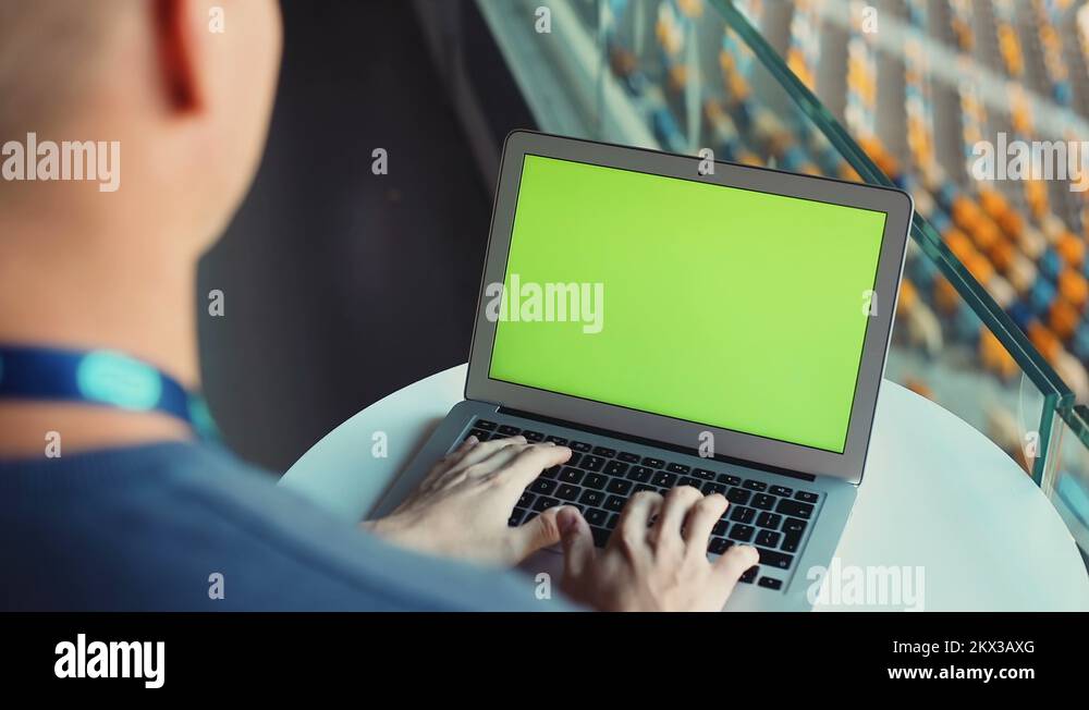 close-up hands man mlae typing keyboard computer coffee shop ...