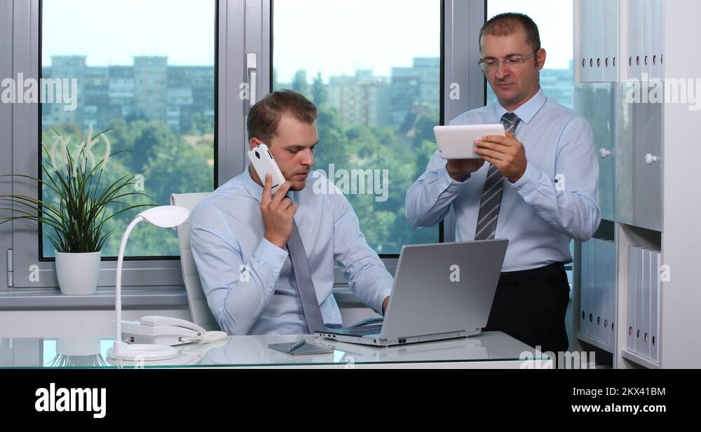 Team of Business Men Teamwork Collaborating in Office Room Multitasking ...