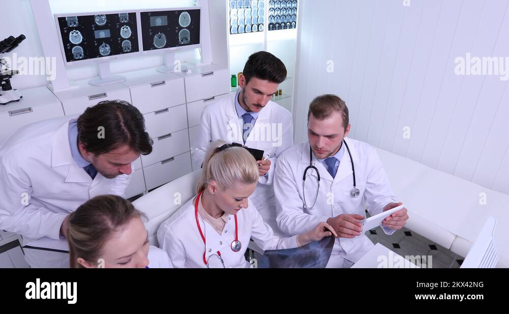 Busy Medical Group of Doctors Talk Pulmonary X-Ray Diagnostic Hospital ...