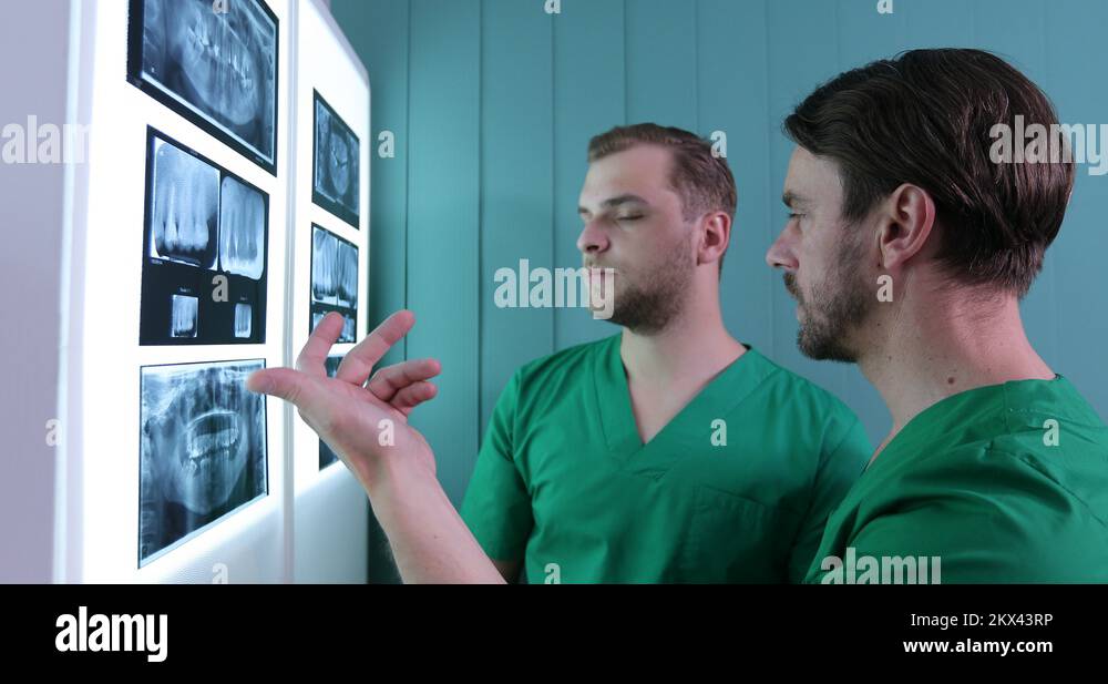 Team of Dentist Men Talk About Dental X-Ray Radiography Teamwork Clinic ...