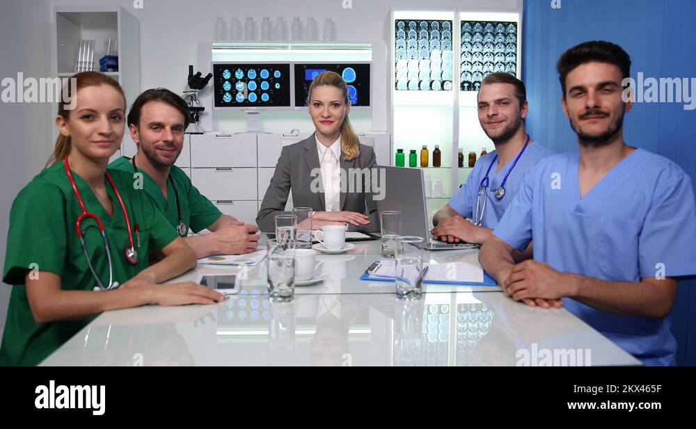 Manager Hospital Woman and Team of Doctors Staff Posing Smiling Looking ...