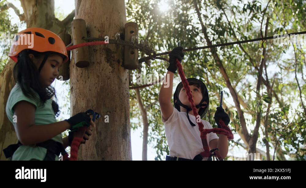 Girl ziplining 4k Stock Video Footage - Alamy