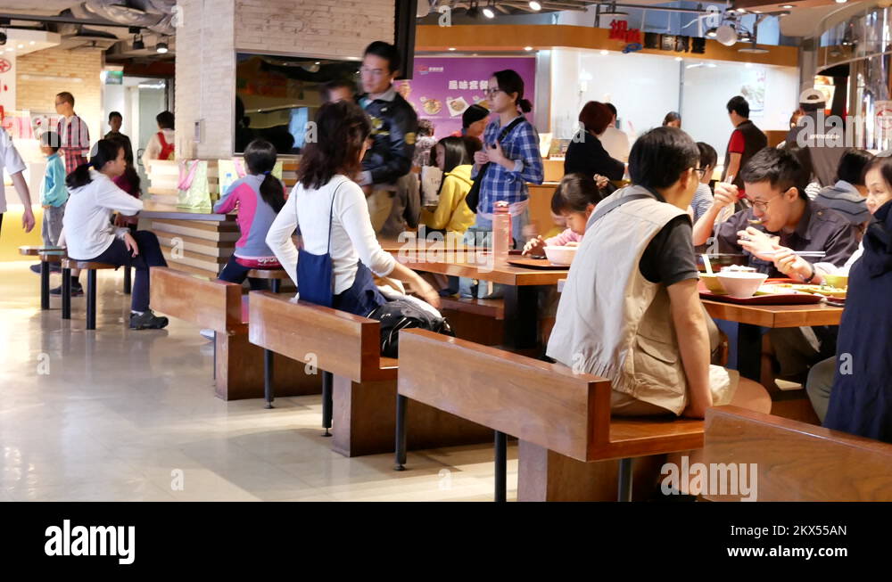 Motion of people eating foods at food court area inside mall with 4k ... Motion of people eating foods at food court area inside mall with 4k ...