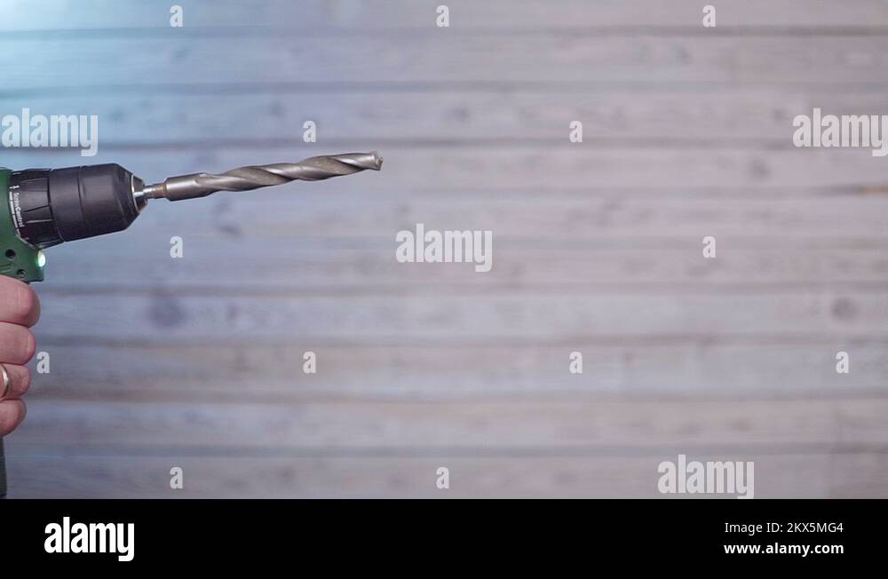 Hand inserts drill Stock Videos & Footage - HD and 4K Video Clips - Alamy