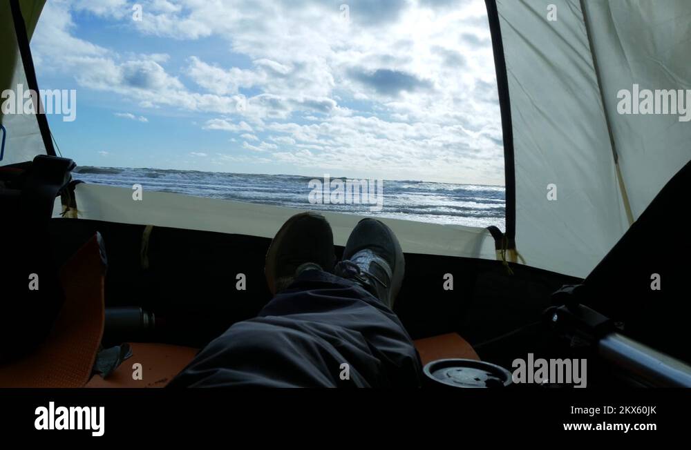 Tent on the beach. 4k. view from the tent on the sea. Sandy shore Stock ...