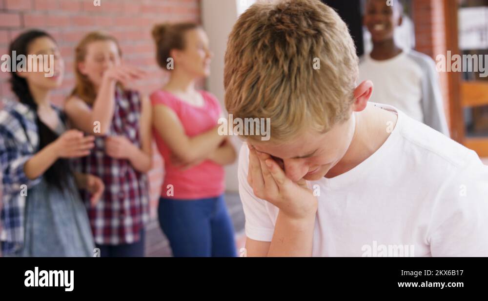 School friends bullying a sad boy in school premise 4k Stock Video ...