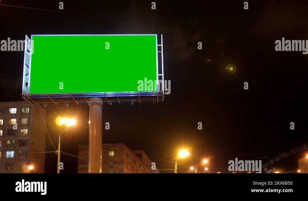 Time Lapse. A Billboard with a Green Screen on a Busy Street Stock ...