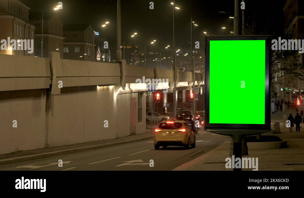 A Billboard with a Green Screen on a Busy Street Stock Video Footage ...