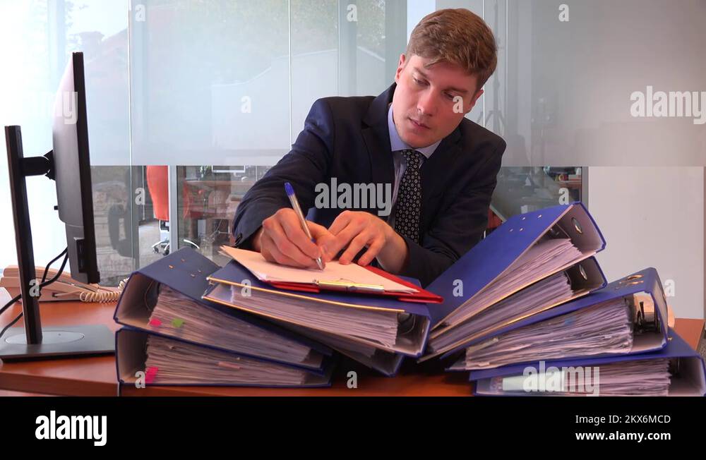 Paperwork overwhelmed Stock Videos & Footage - HD and 4K Video Clips ...
