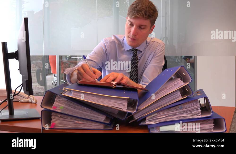 Man workload desk Stock Videos & Footage - HD and 4K Video Clips - Alamy