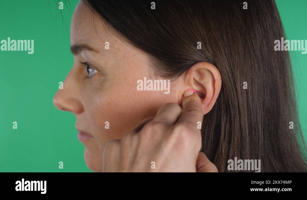 Woman noise ear plug Stock Videos & Footage - HD and 4K Video Clips - Alamy