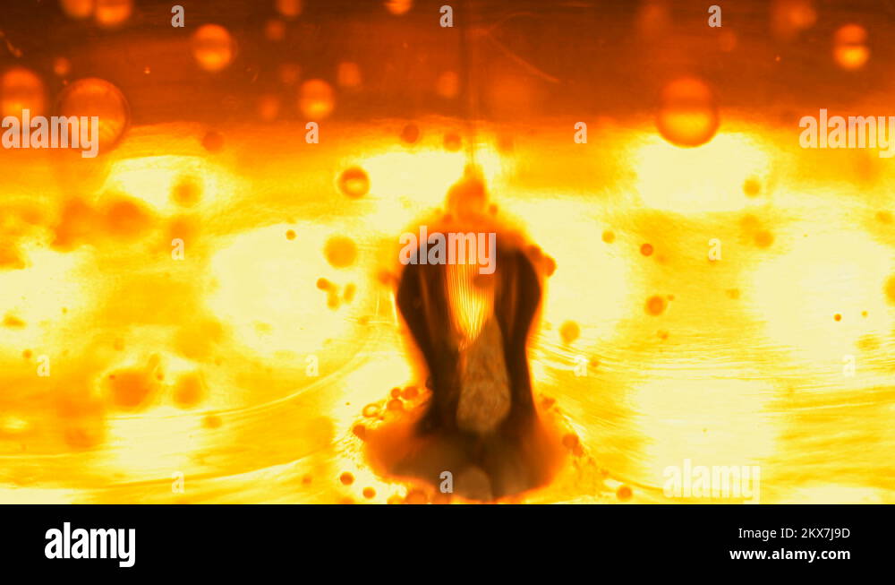 hot hot oil is a red yellow color,like boiling lava,where bubbles rise ...