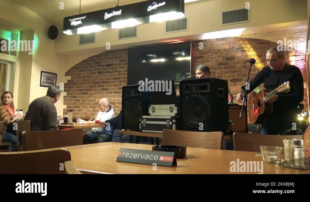 Two men sing and play karaoke in a bar Stock Video Footage - Alamy