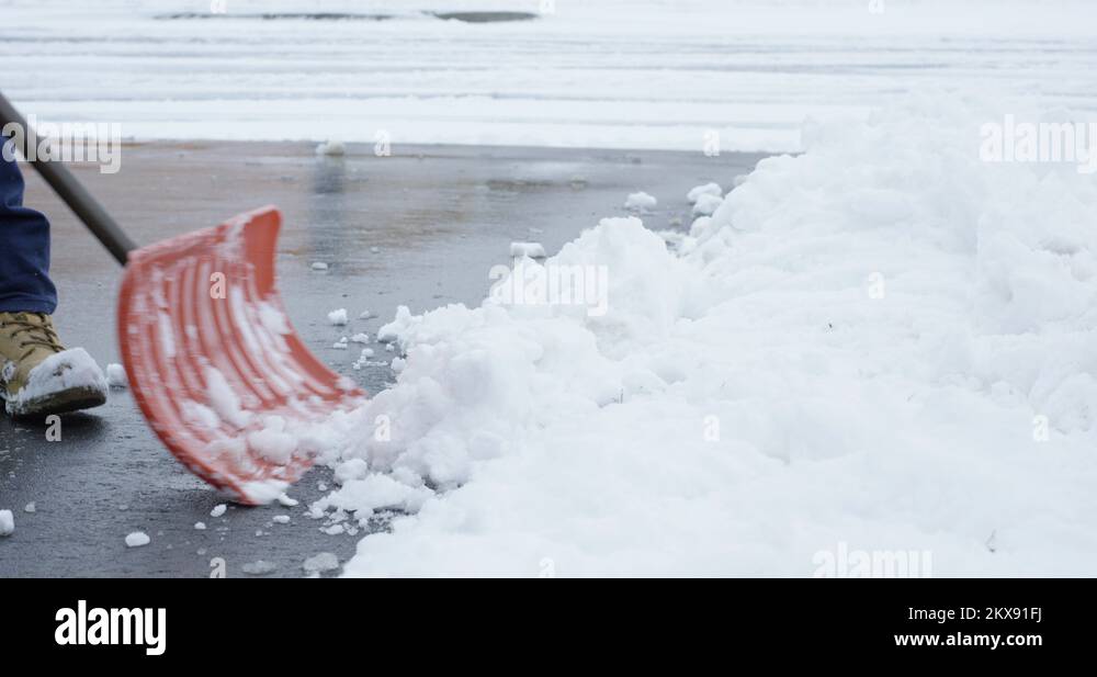 Shoveling snow off driveway Stock Videos & Footage - HD and 4K Video ...