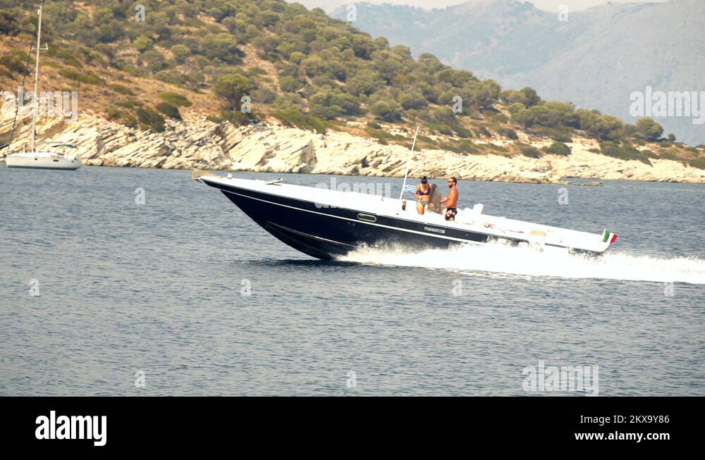 People on motorboat sailing on sea, super slow motion 240fps Stock ...