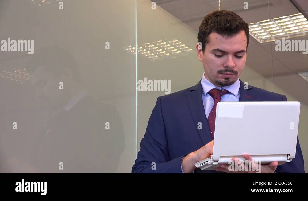 Banker standing Stock Videos & Footage - HD and 4K Video Clips - Alamy