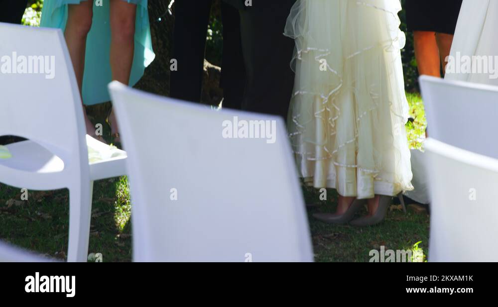 Bride and groom hugging each other, guest clapping in background 4K 4k ...
