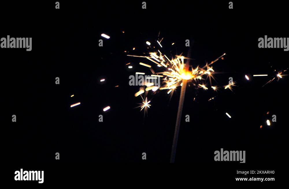 Sparkler Over Black. Gun powder sparks shot against deep dark ...