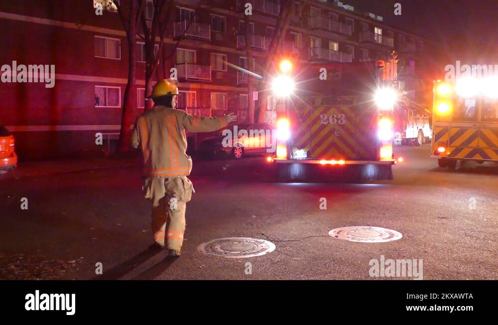 Firefighter Guiding Reversing Fire Truck At Scene Stock Video Footage ...