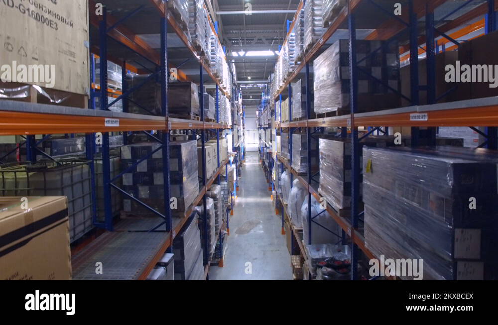 A huge warehouse facility with stretch wrapped pallets Stock Video ...