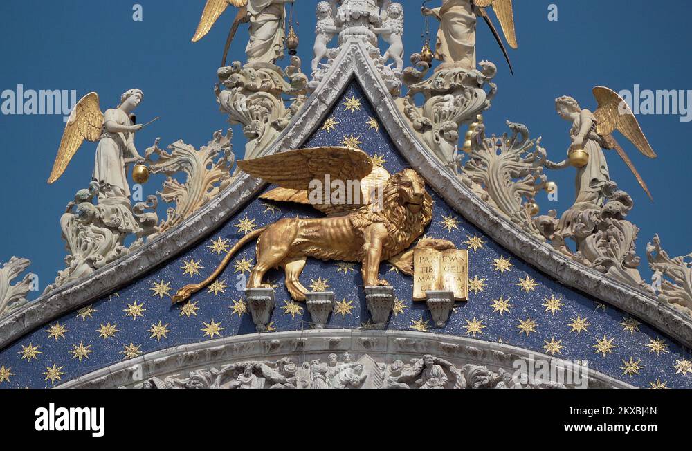 Close up detail of the Gothic architecture & the Lion of St Marks ...