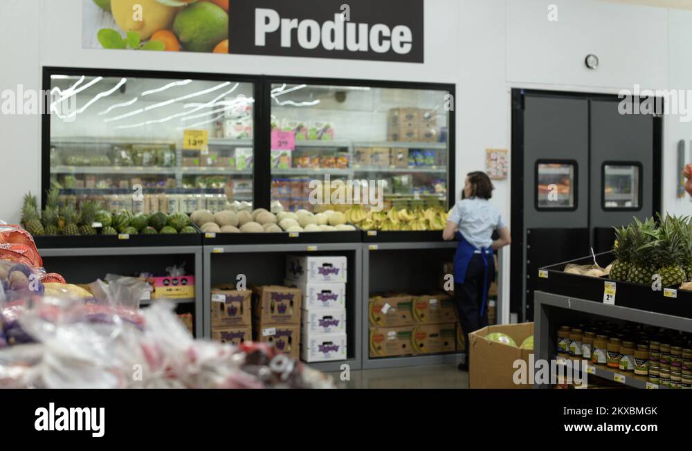Employees working in a warehouse supermarket Stock Video Footage - Alamy