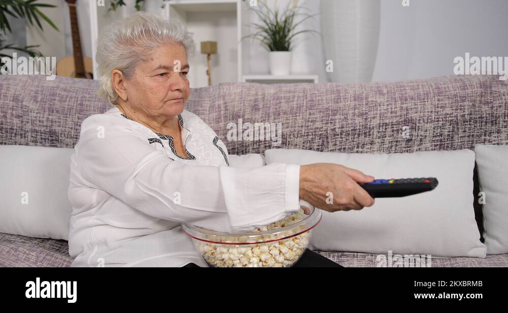 Older woman watching tv Stock Videos & Footage - HD and 4K Video Clips ...