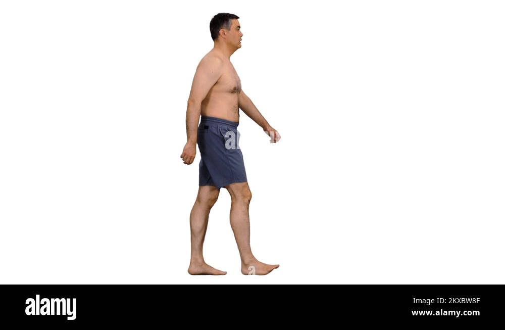 Side view middle aged man in shorts walking barefoot, alpha channel ...