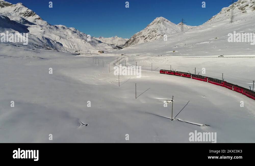Bernina express, unesco heritage in the Swiss Alps. Red Train of ...