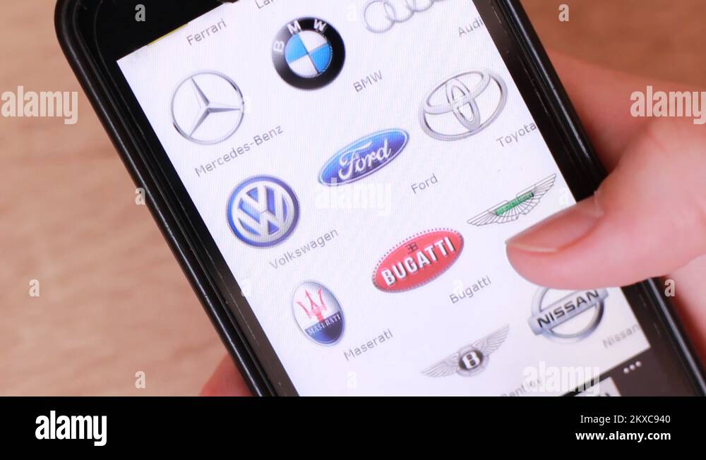 Looking through car brands logos on the smartphone Stock Video Footage ...