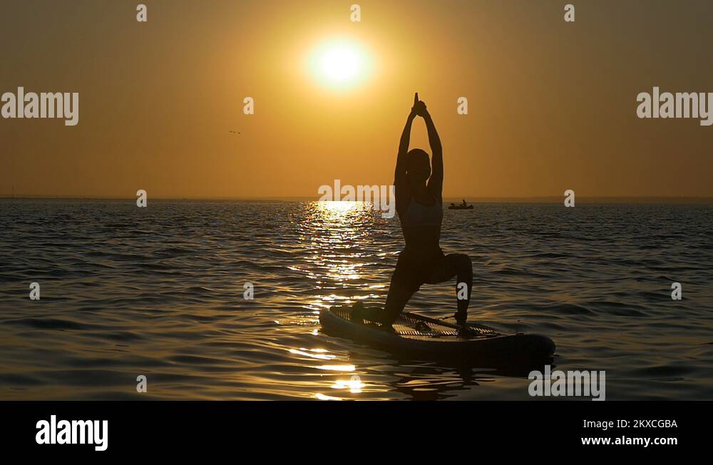 Paddle board exercises Stock Videos & Footage - HD and 4K Video Clips ...