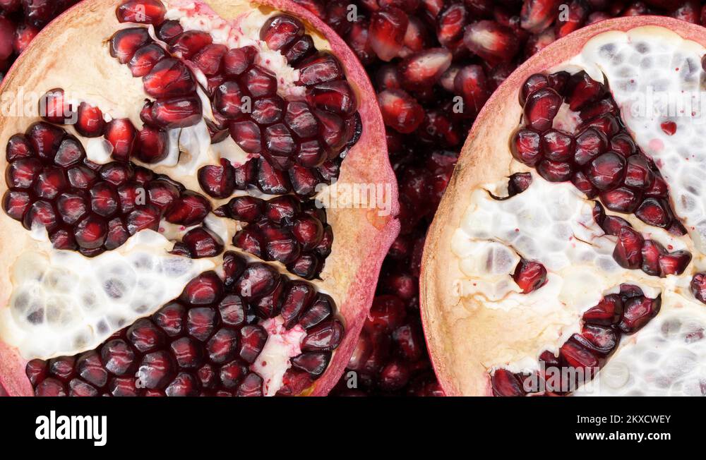 Rotating pomegranate fruit and seeds, top view Stock Video Footage - Alamy