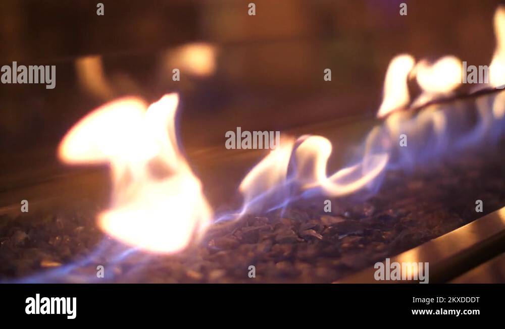 Fire flame Flames in a Modern Fireplace roaring gas burning outdoors at ...