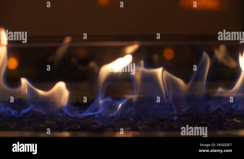 Fire flame Flames in a Modern Fireplace roaring gas burning outdoors at ...