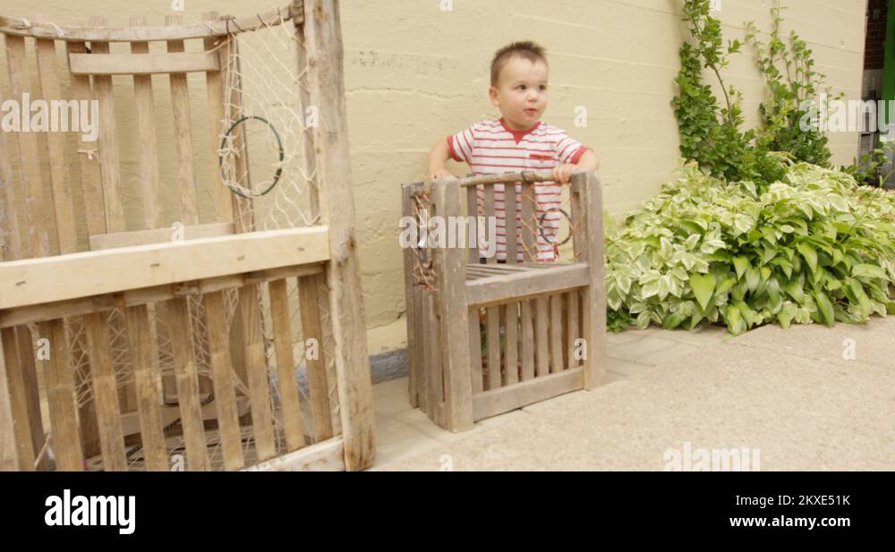 Behind chair Stock Videos & Footage - HD and 4K Video Clips - Alamy