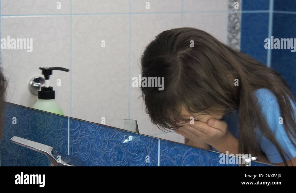 The child washes. A little girl is washing her face Stock Video Footage ...