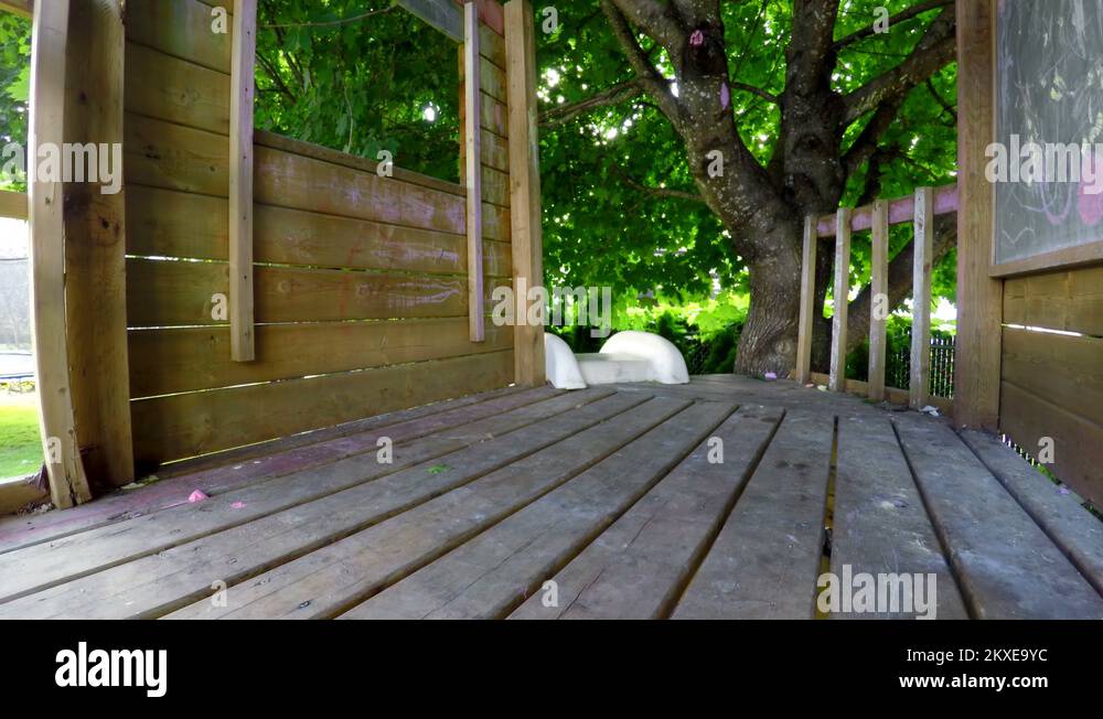 Boy walking up the slide and playing with toy gun 4k Stock Video ...