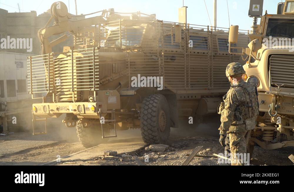 US. military vehicle entering to a Kurdistan rubble zone Stock Video ...