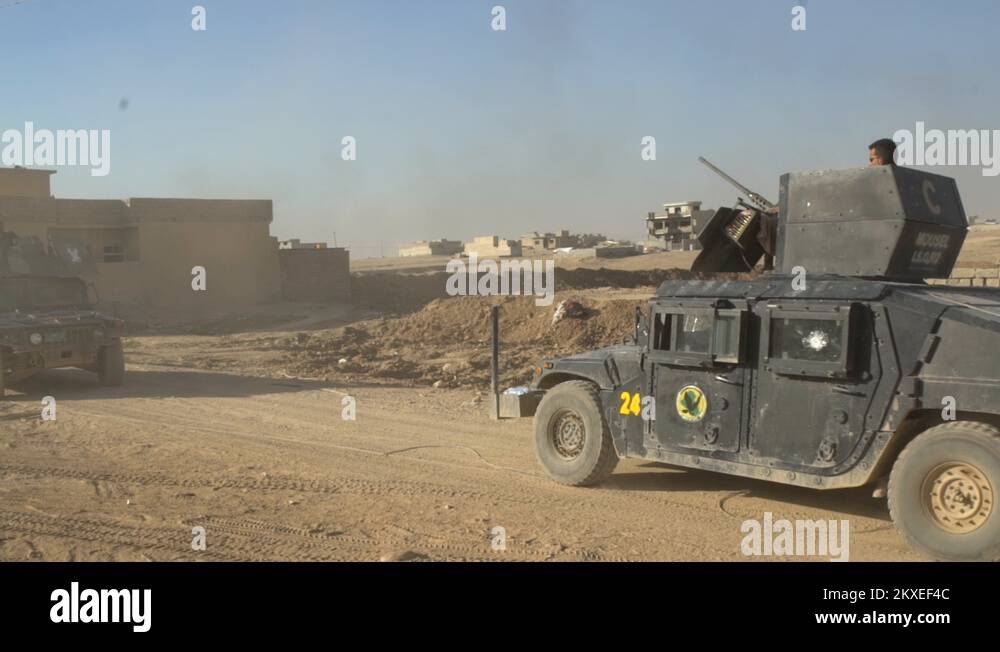 Iraqi army patrols carrying a flag depicting Imam Hussein; Shiite ...