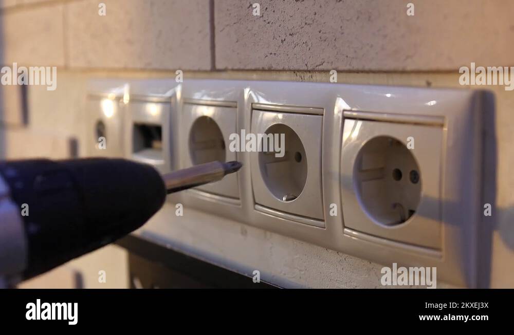 Mounting the electrical socket with a screwdriver. 3840x2160, 4K Stock ...