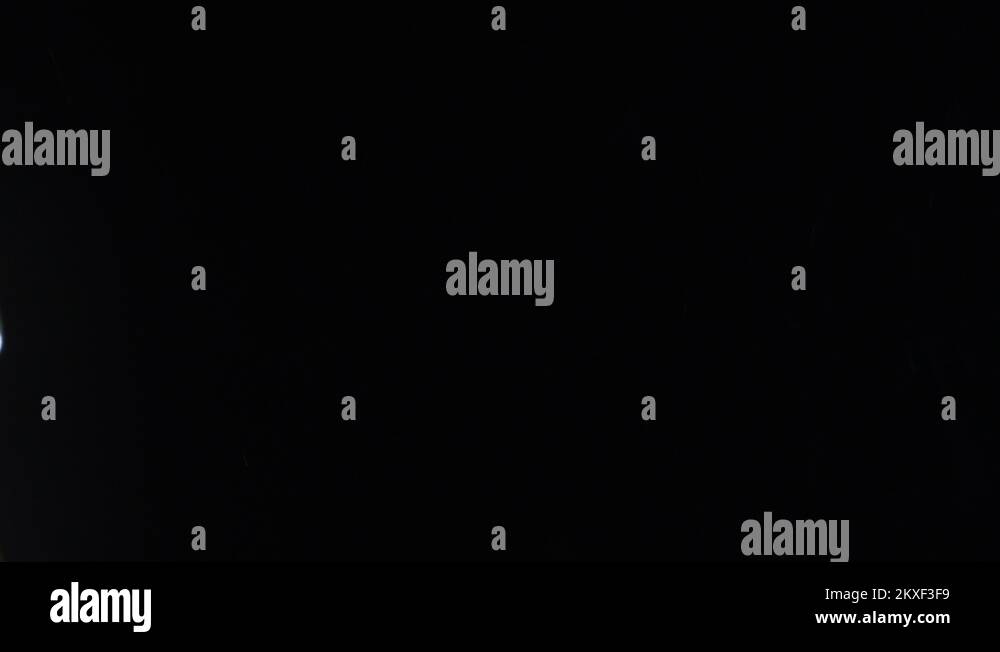 Pan to awards trophy with dynamic particles black background Stock ...